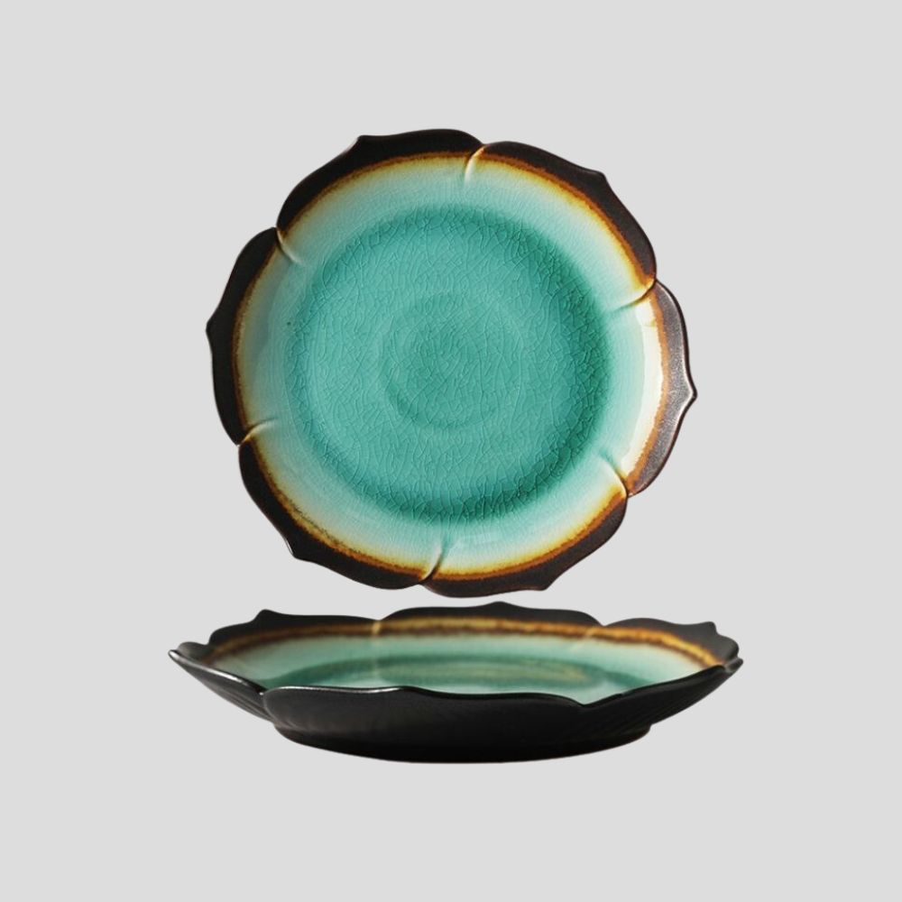 Flower-shaped handmade plate with vibrant blue glaze – Crafty-Clayworks